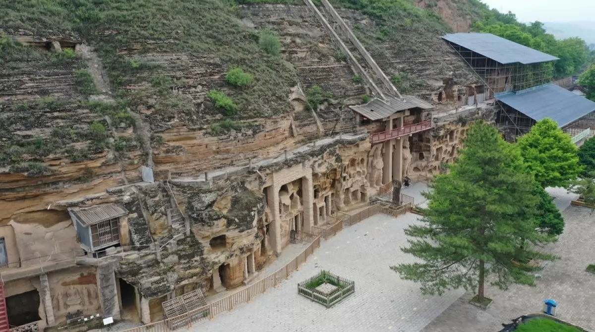 Millennium-old grotto temple unfolds protection umbrellas ahead of ...
